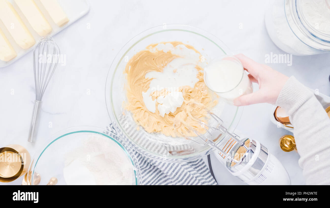 Step by step. Mixing ingredients for vanilla cupcakes Stock Photo - Alamy