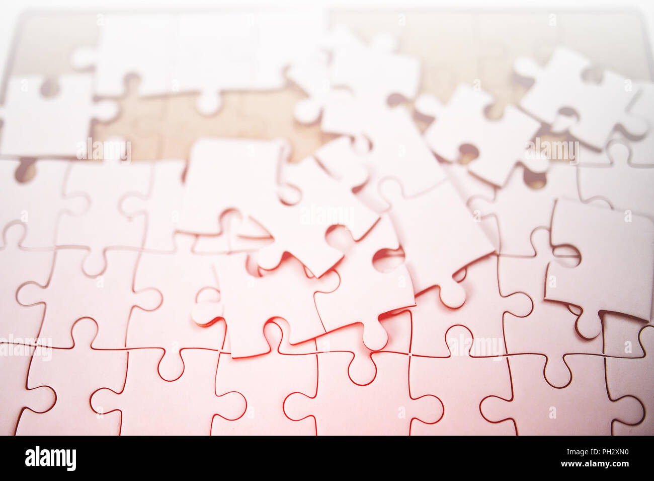 A white jigsaw puzzle is placed on it Stock Photo - Alamy