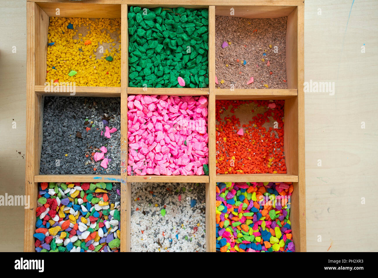 Colored stone and colorful rock with equipment tools for people working ...
