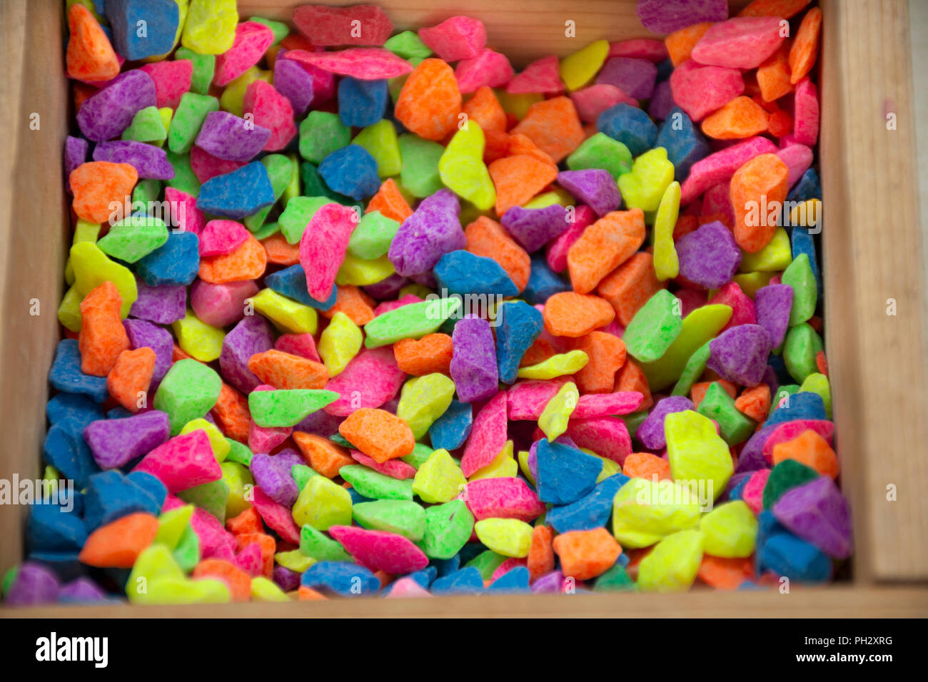 Colored stone and colorful rock with equipment tools for people working ...