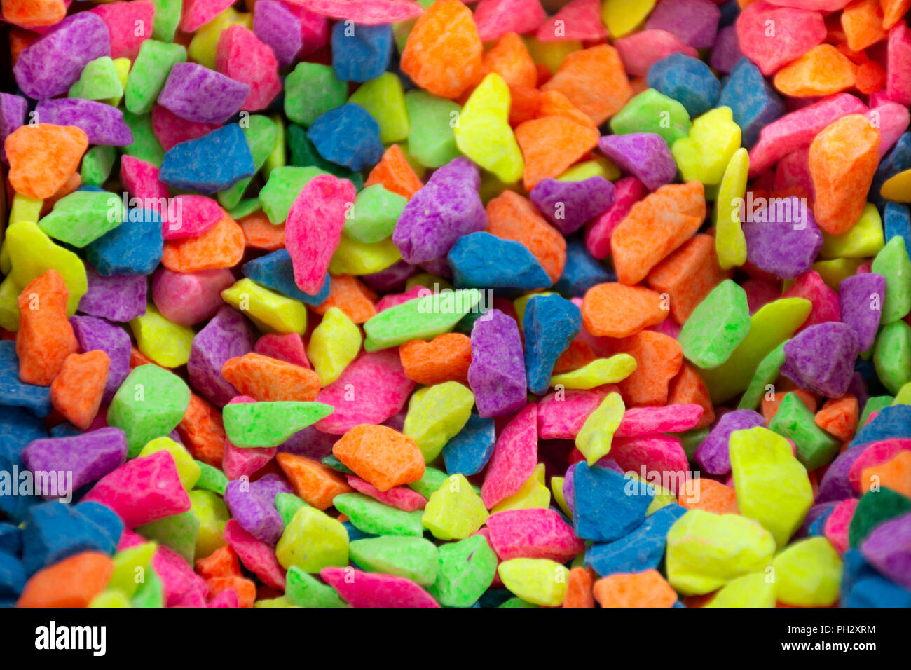 Colored stone and colorful rock with equipment tools for people working ...