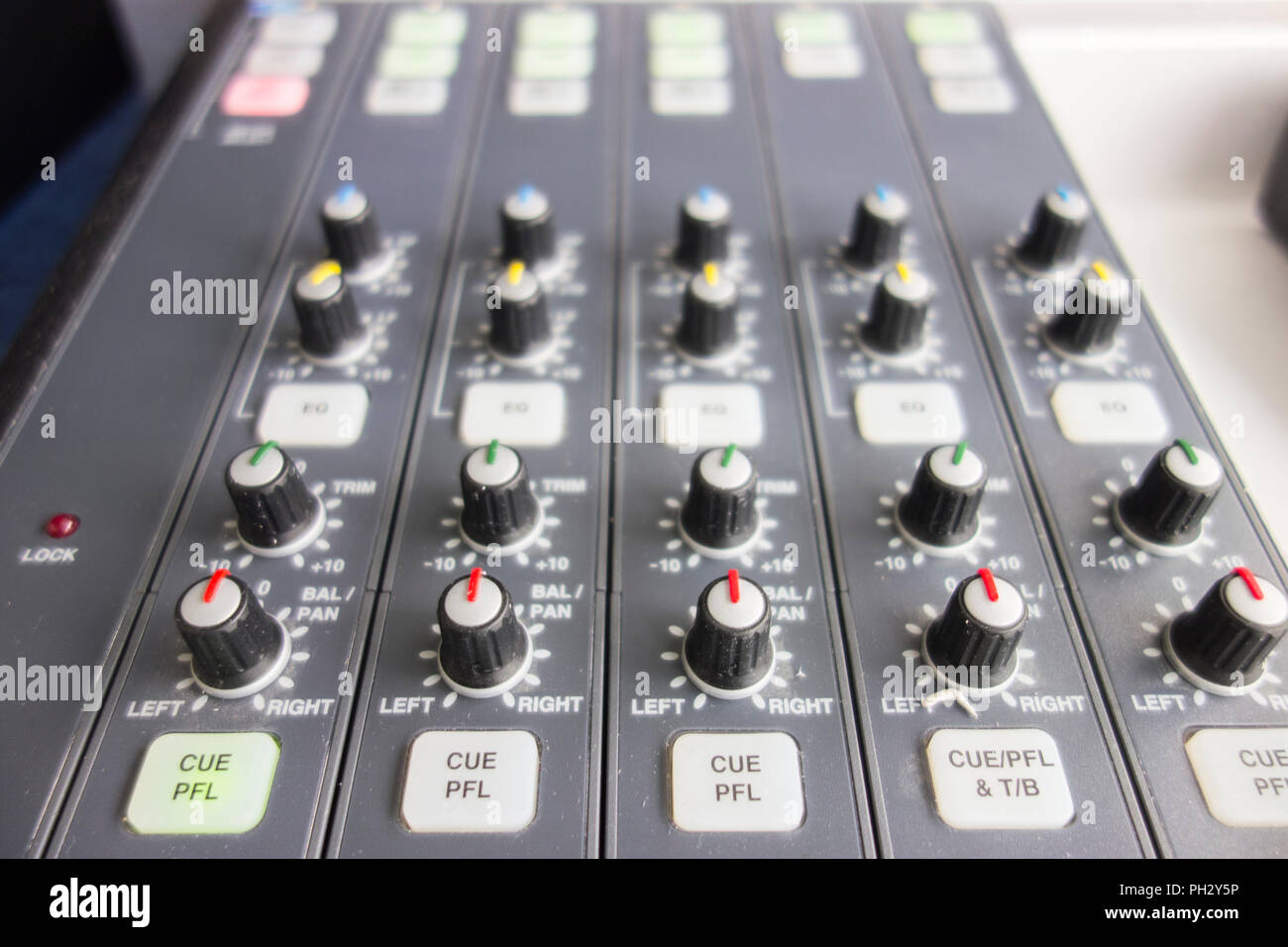 Radio station mixing desk controls and dials Stock Photo - Alamy