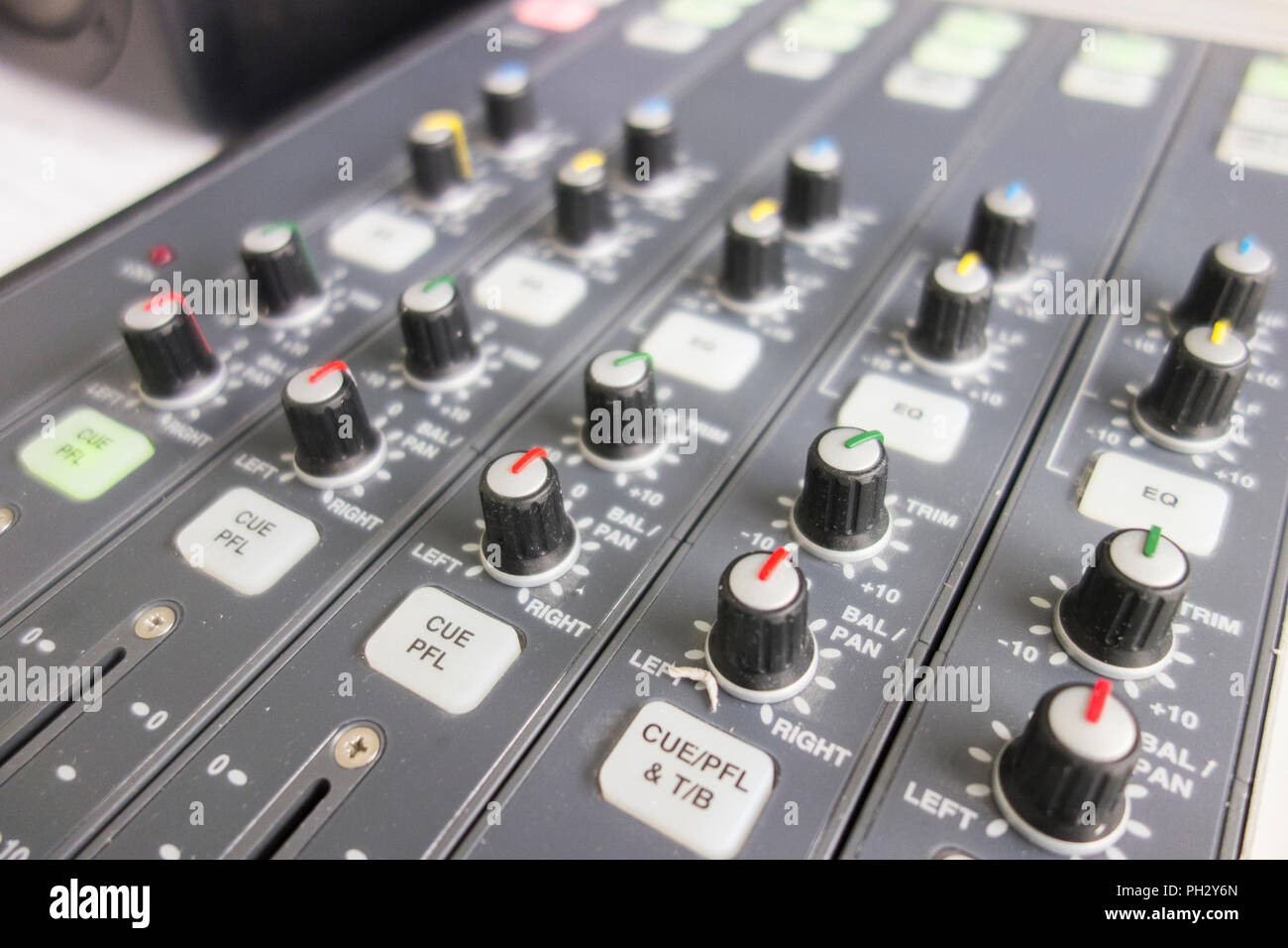 Radio station mixing desk controls and dials Stock Photo - Alamy