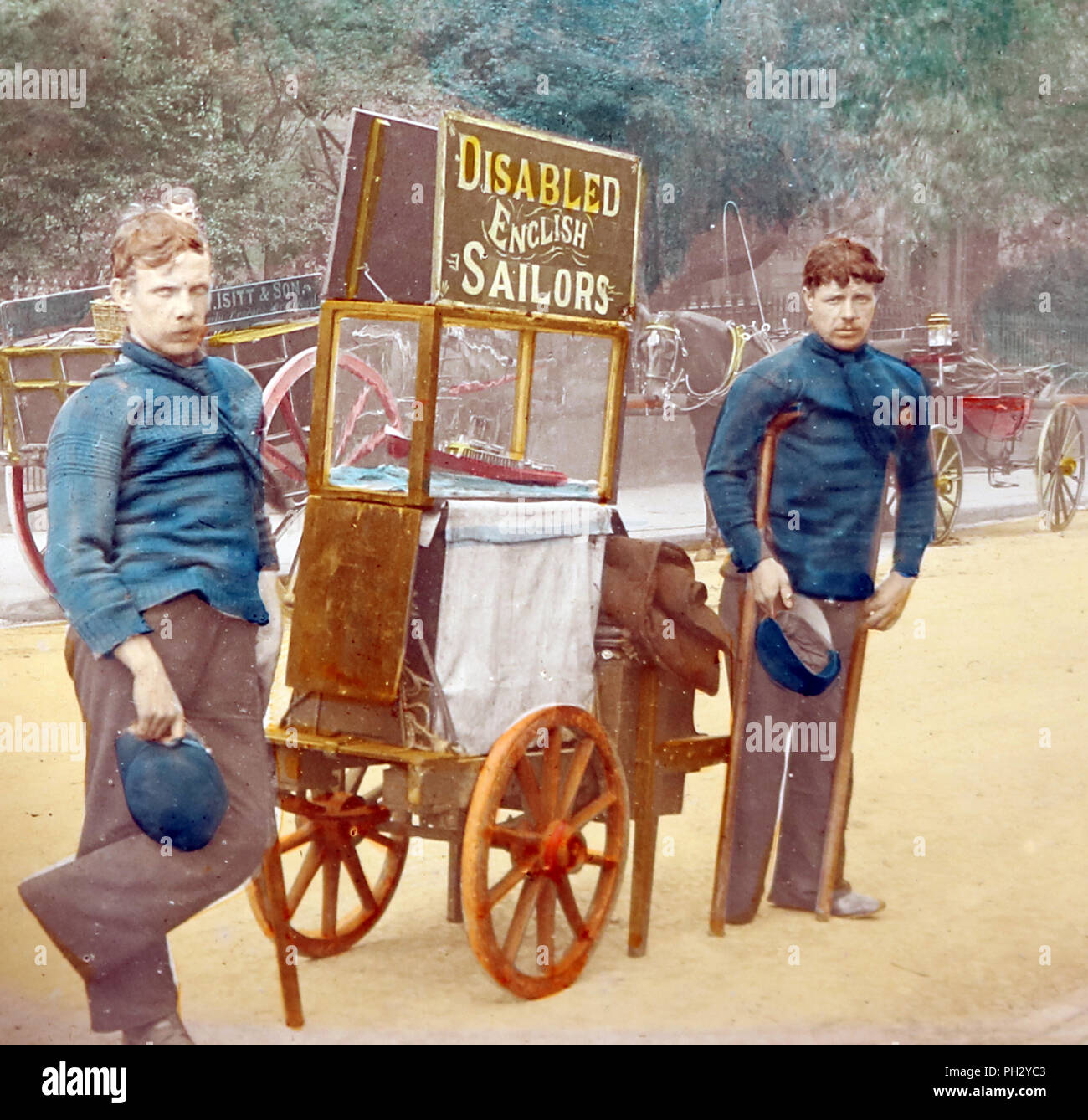 Disabled sailors with a mechanical street organ, Victorian period Stock ...