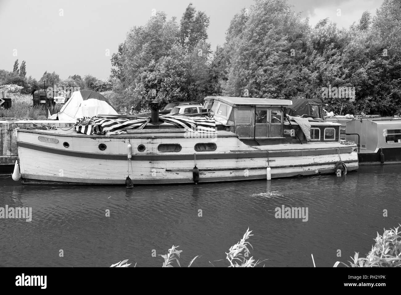 Moored narrow boats Black and White Stock Photos & Images - Alamy