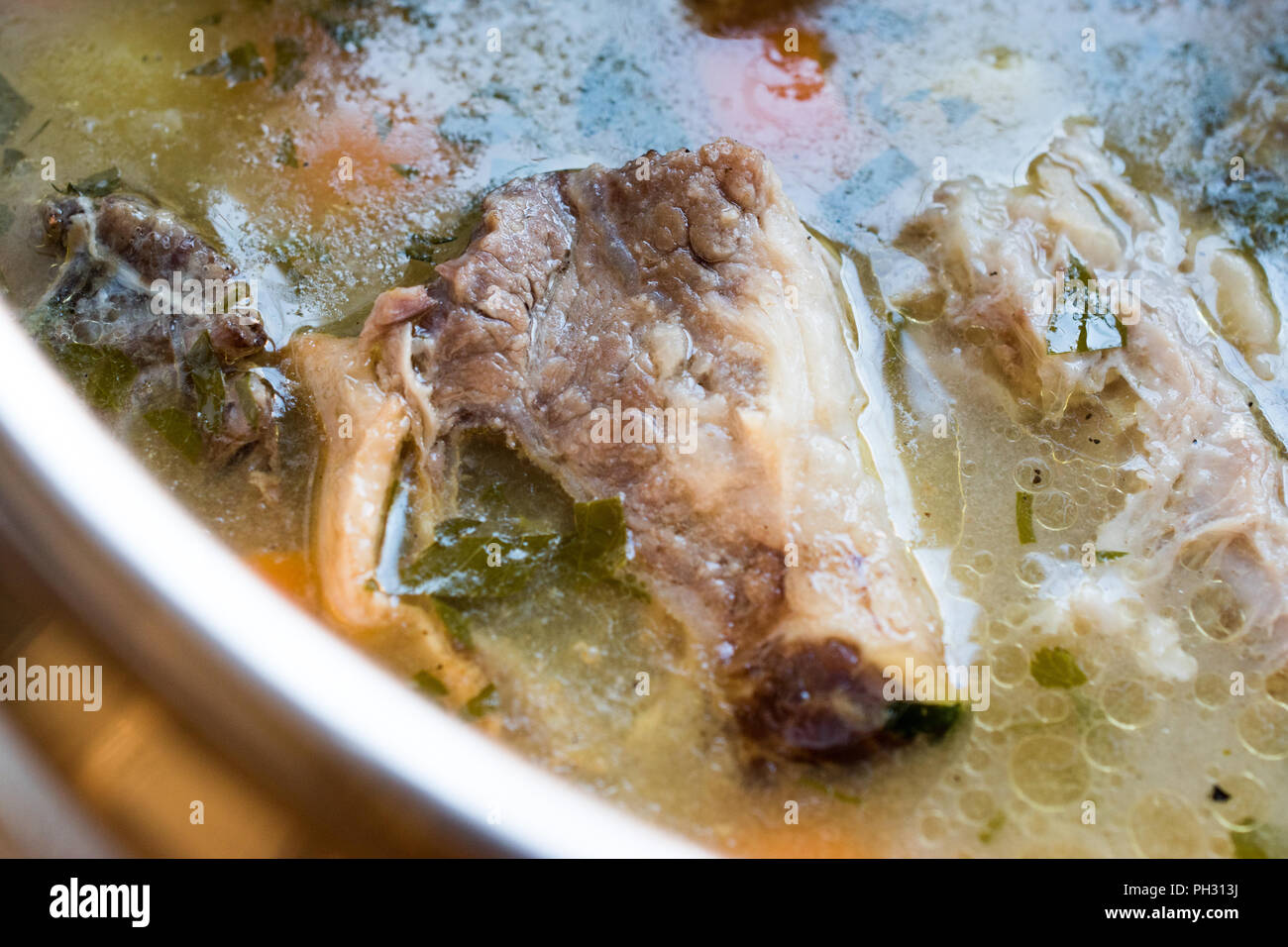 Homemade Meat Stew Beef Rip Soup with Vegetables in Pan. Traditional ...