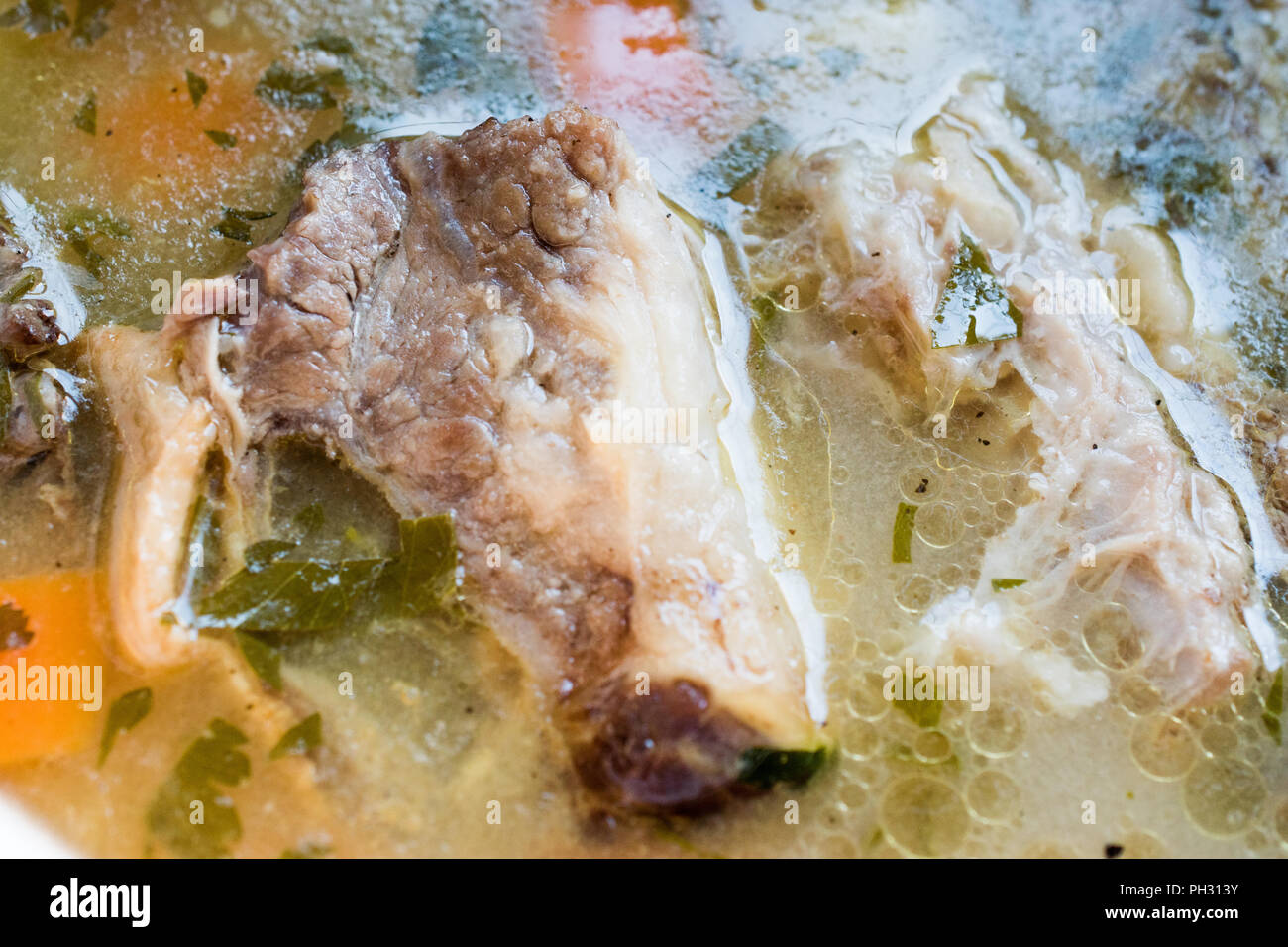 Homemade Meat Stew Beef Rip Soup with Vegetables in Pan. Traditional ...