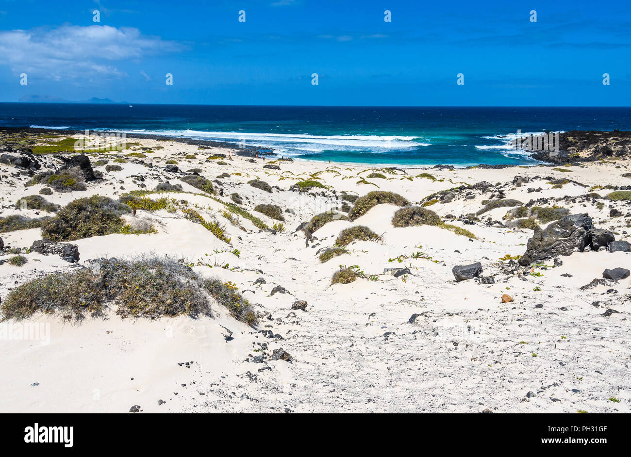 White sand beach in Caletón Blanco in Lanzarote, Canary Islands, Spain ...