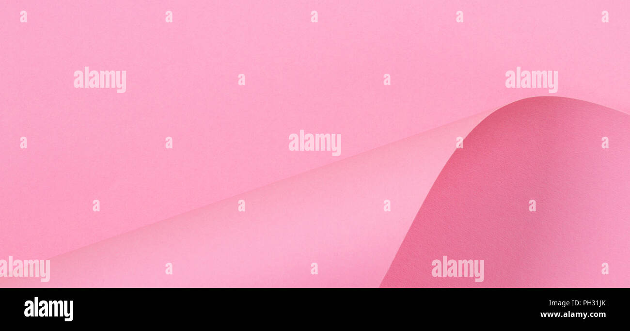 Abstract geometric shape pink color paper background Stock Photo - Alamy