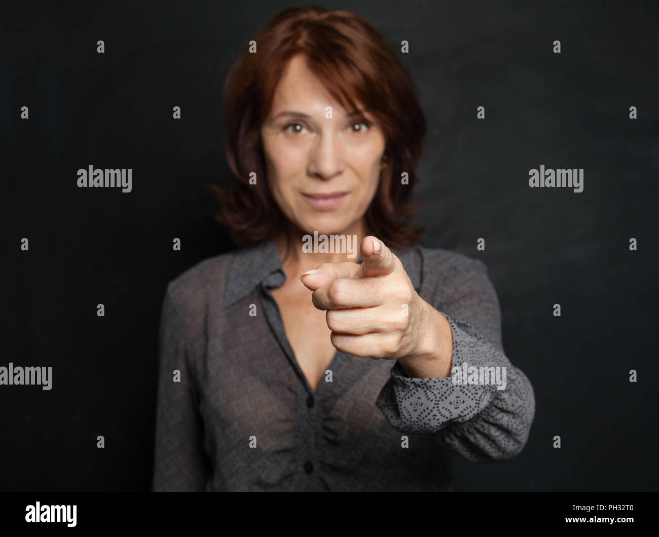Old age woman pointing finger hi-res stock photography and images - Alamy