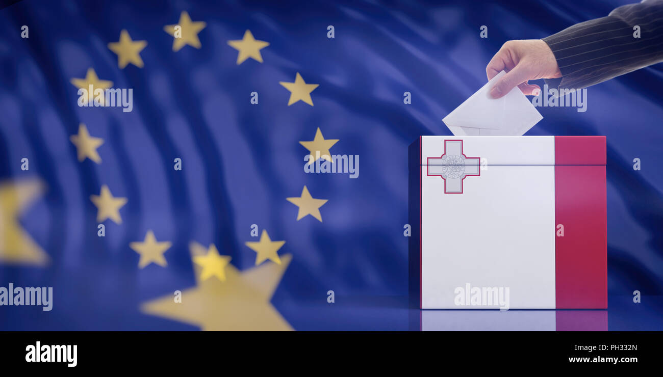 Elections in Malta for EU parliament. Hand inserting an envelope in a ...