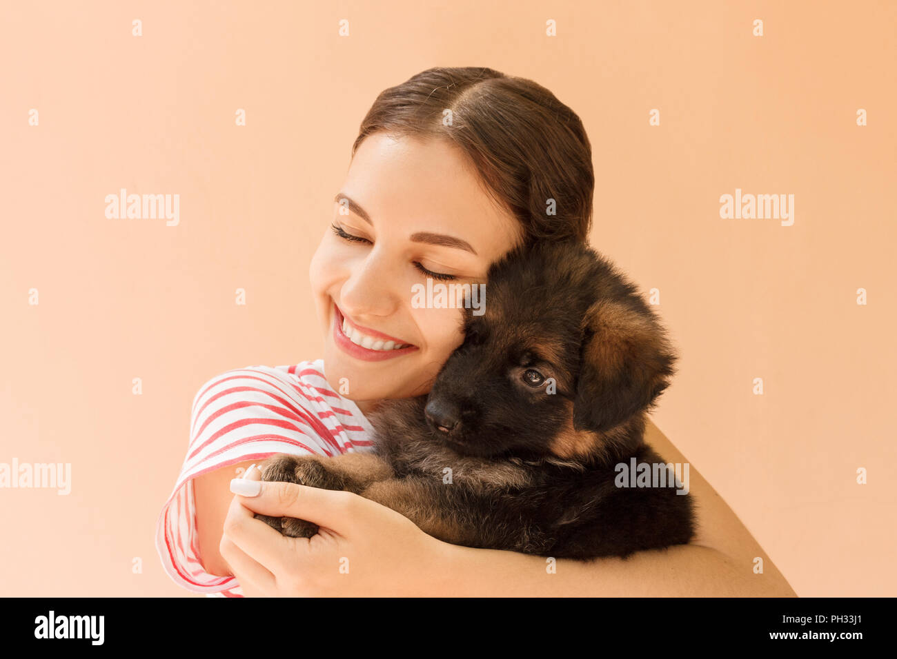 Caucasian teenager hugging dog hi-res stock photography and images - Alamy
