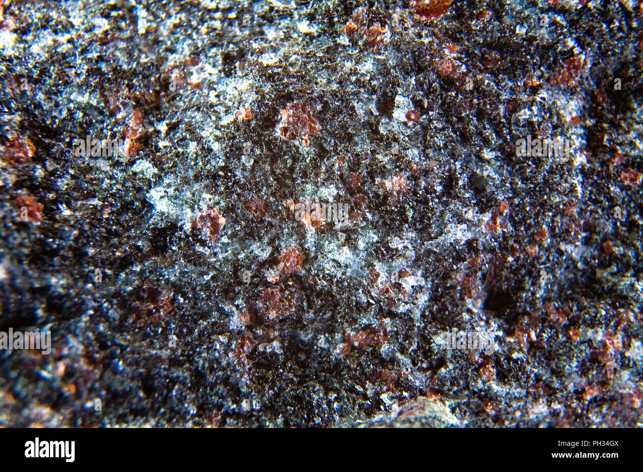 The texture of a granite stone is photographed close-up. Geology Stock ...