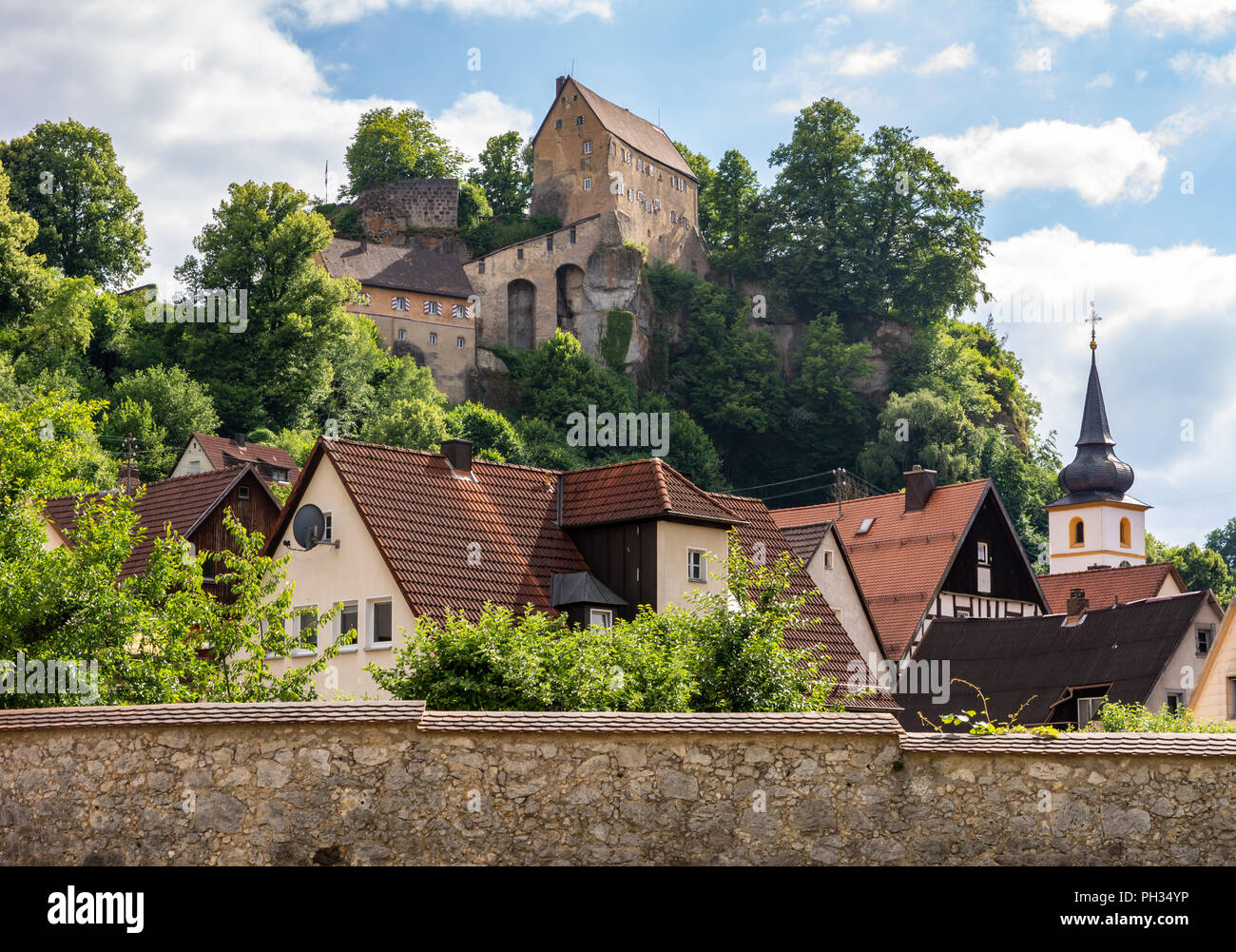 POTTENSTEIN, GERMANY - JUNE 18: HIstoric castle above the village of ...