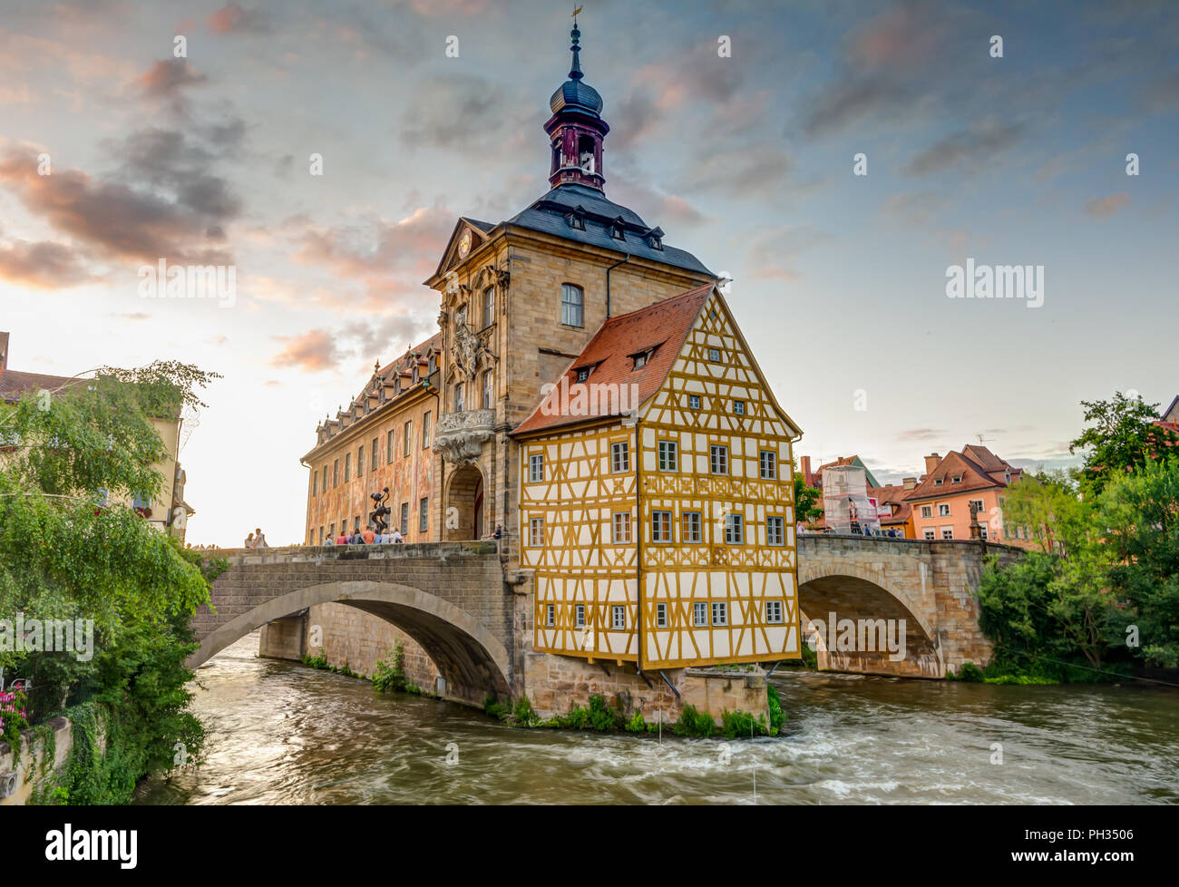 BAMBERG, GERMANY - JUNE 19: Tourists at the historic town hall in ...