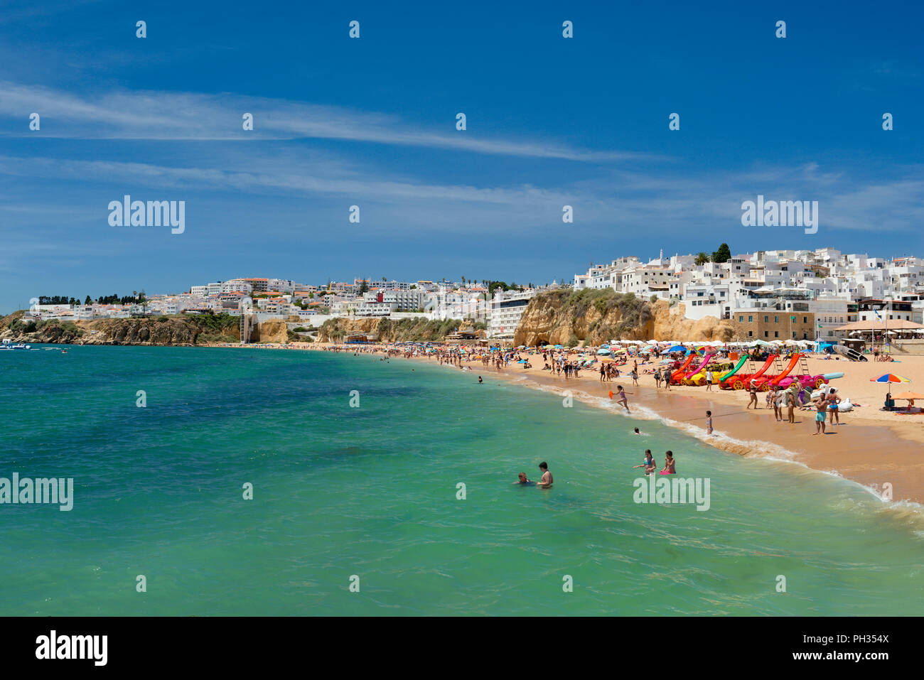 Albufeira beach and old town, in summer with the Hotel Sol e Mar Stock ...