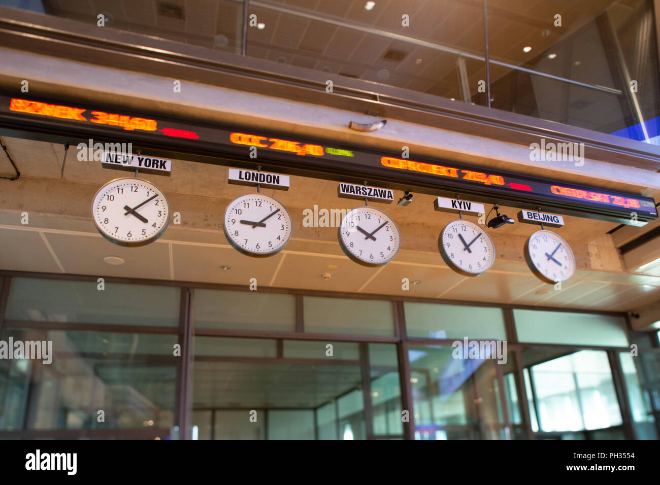 Poland, Warsaw. August 17, 2018. Clocks display times in various time ...