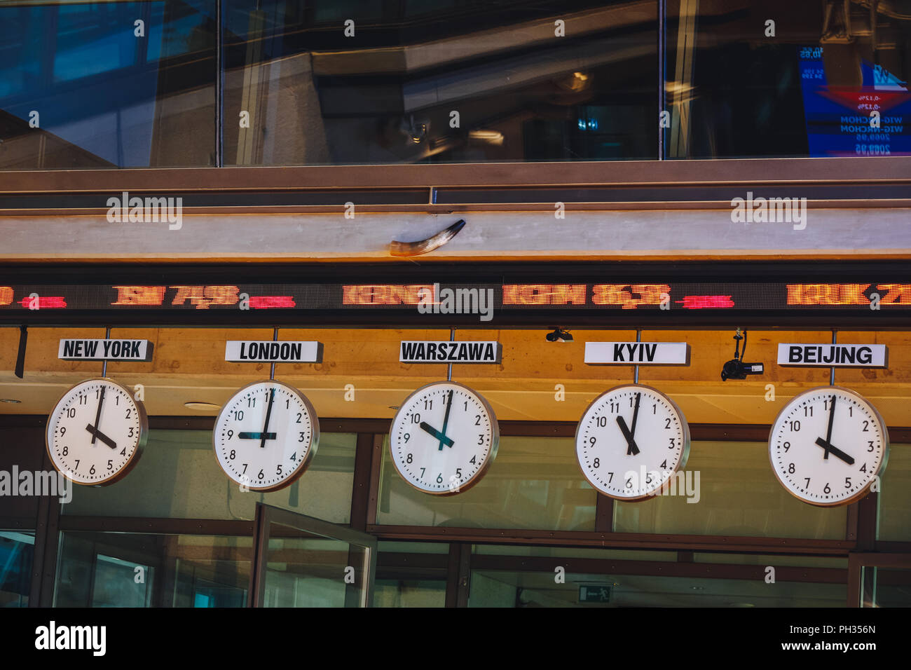 Poland, Warsaw. August 17, 2018. Clocks display times in various time ...