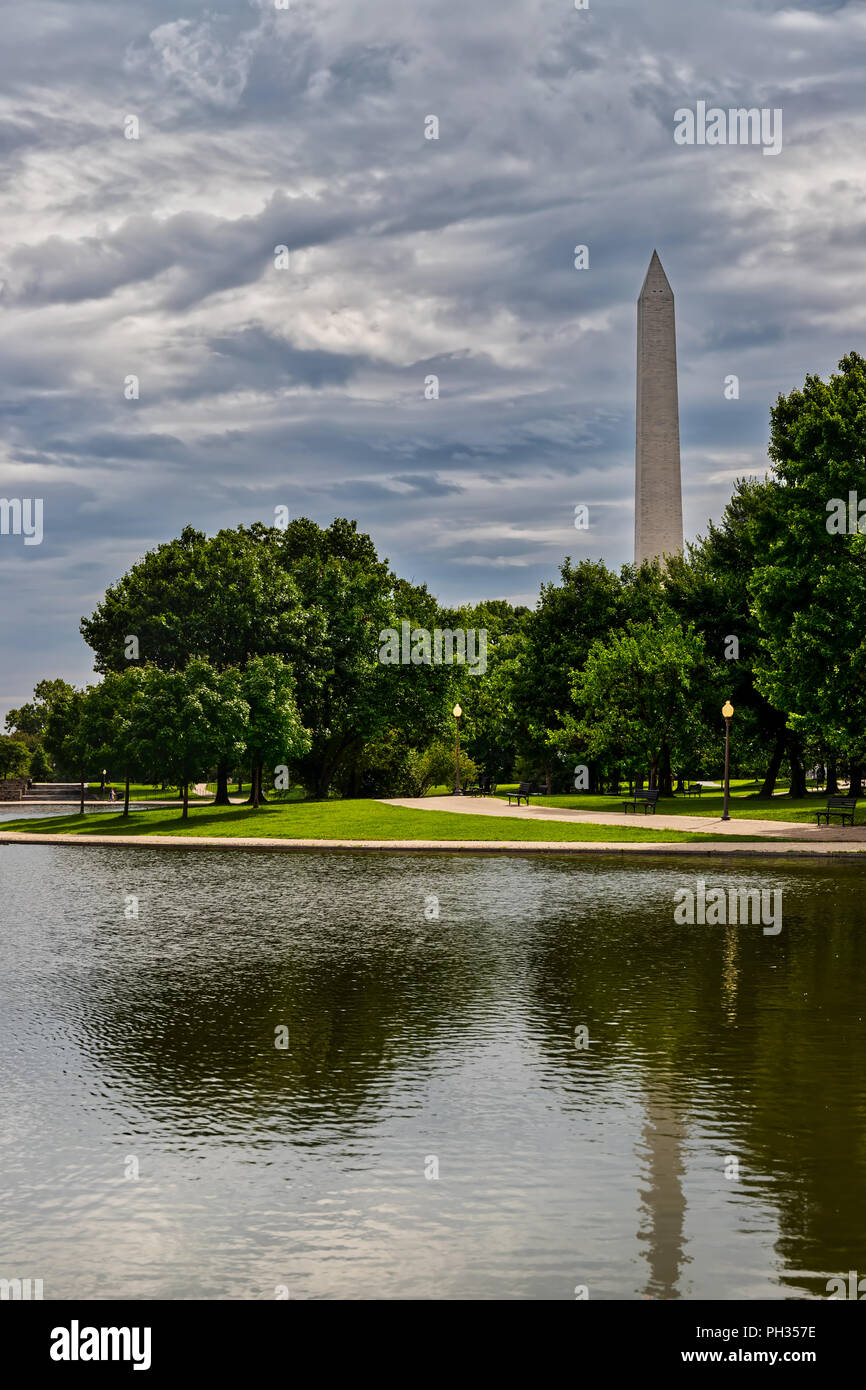 A park view of the Washington Monument as seen through the surrounding ...