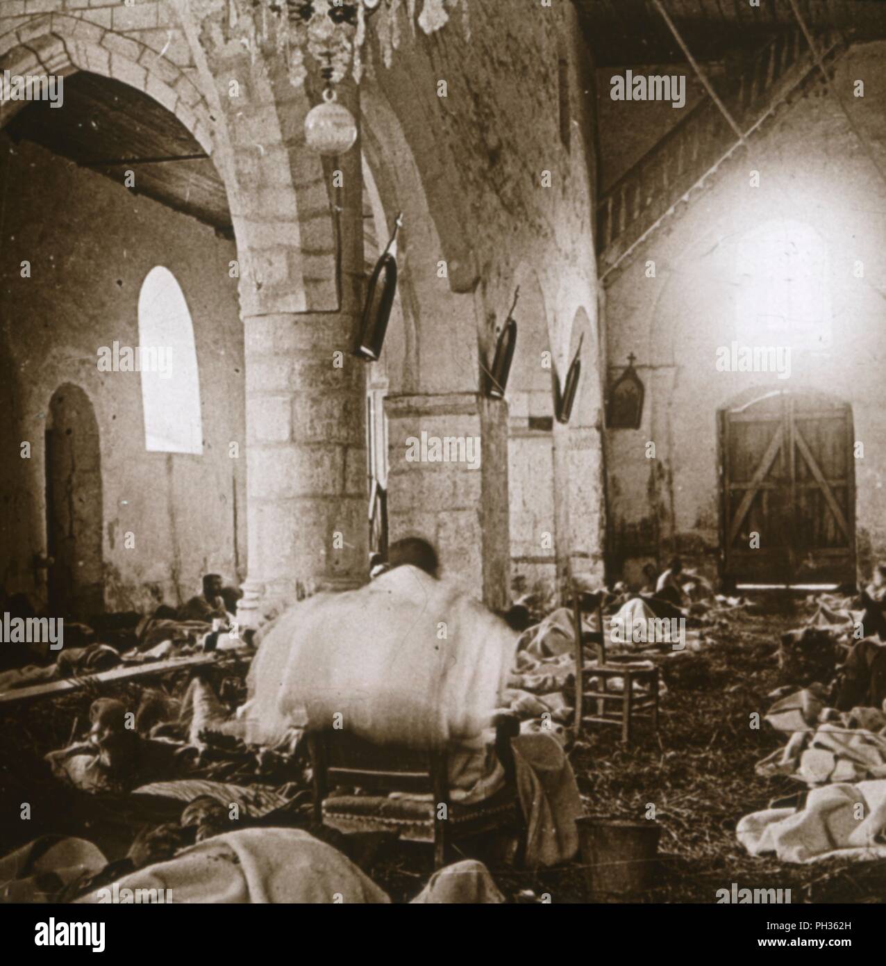 Makeshift hospital in a church, Marne, northern France, 1914. Artist ...