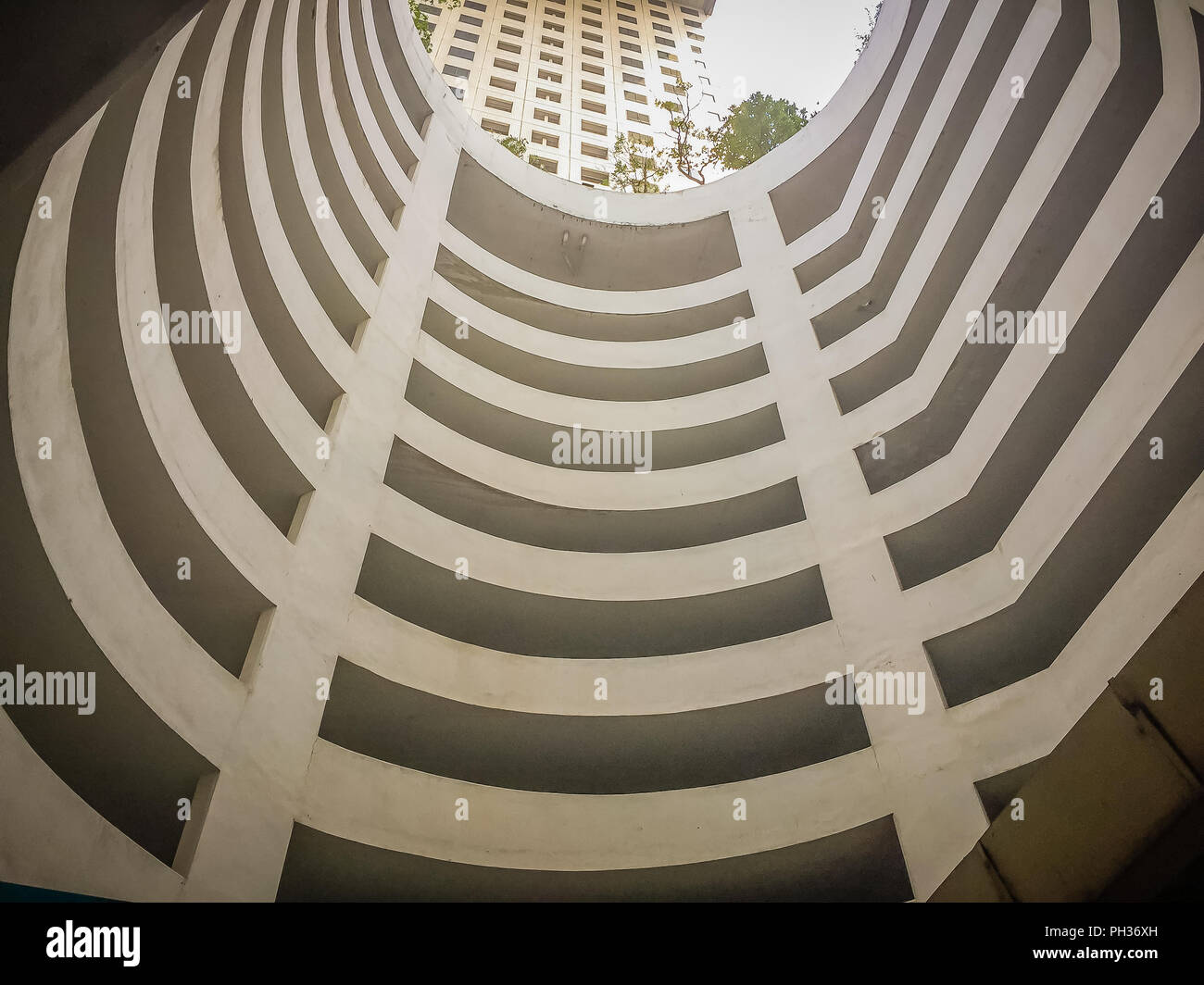 Multi-level of parking garage on the building in oval structure Stock ...