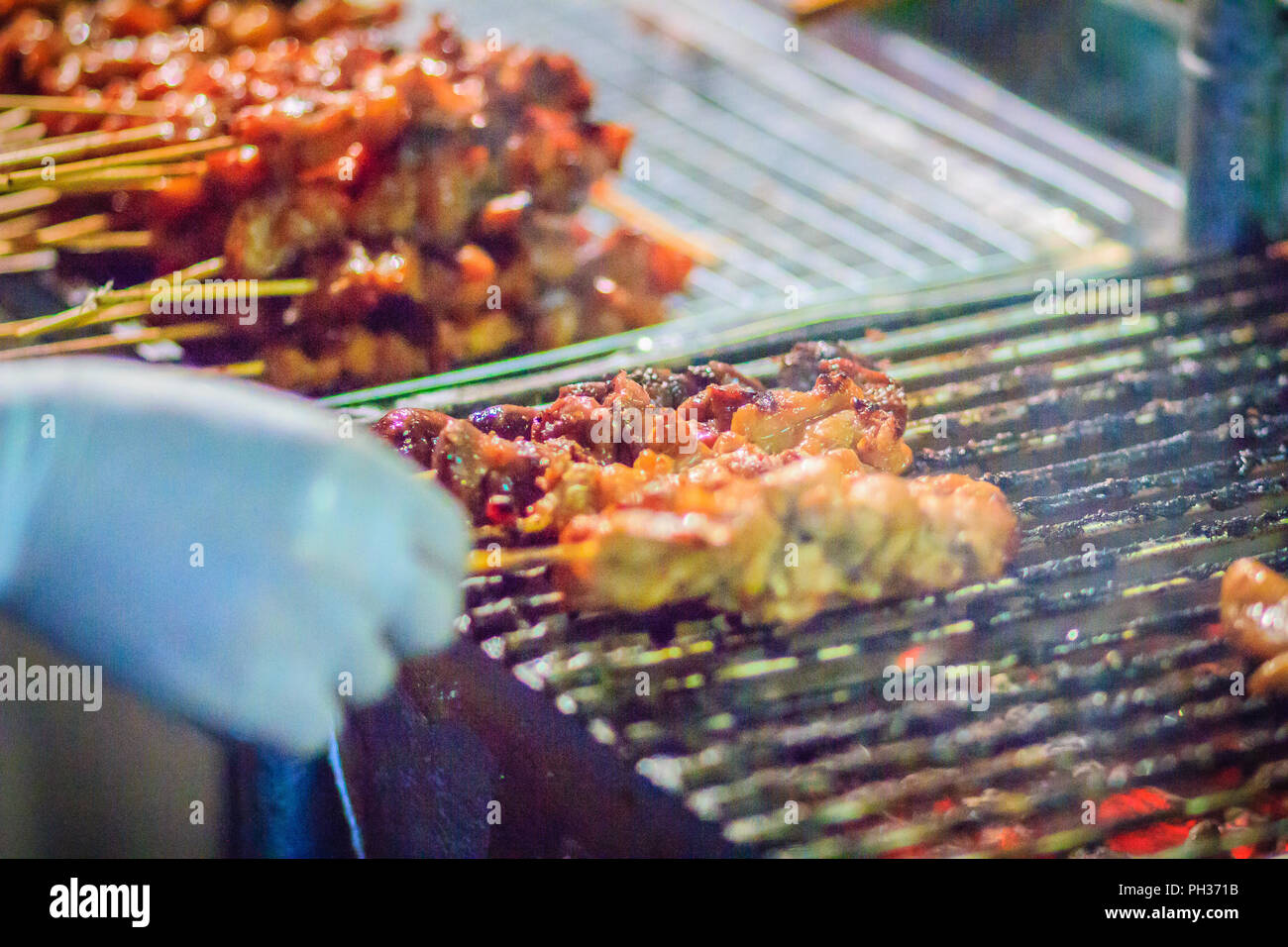 Close up of satay stall in bangkok market hi-res stock photography and ...