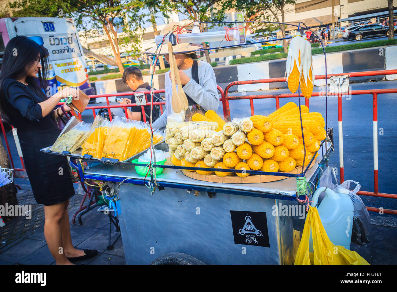 Bangkok, Thailand - March 8, 2017: View of street food vendor while boiling and selling for ...