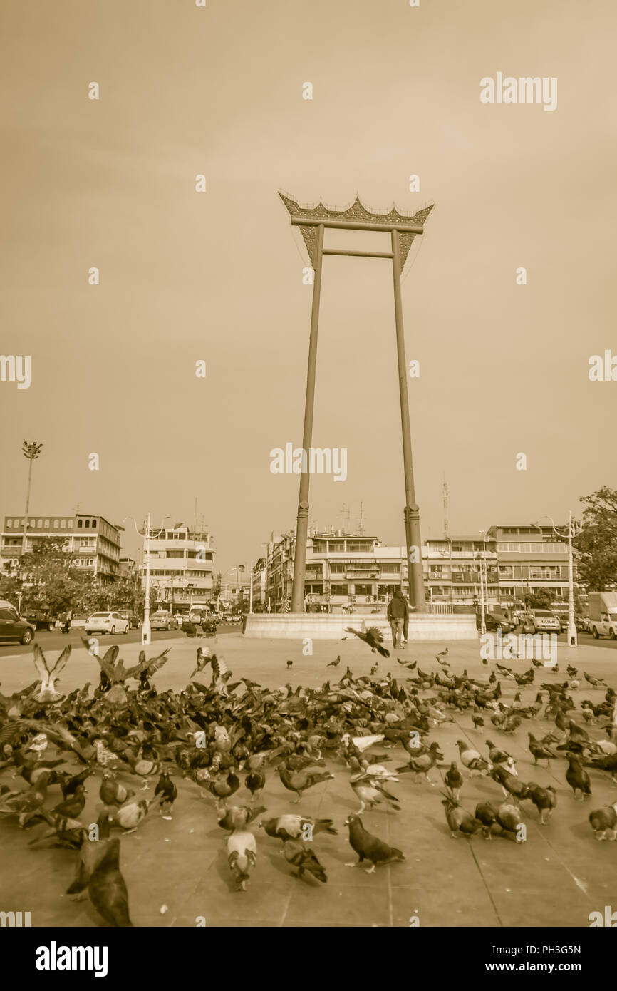 Red giant swing or Sao Ching Cha with the crowd of pigeon, one of the ...