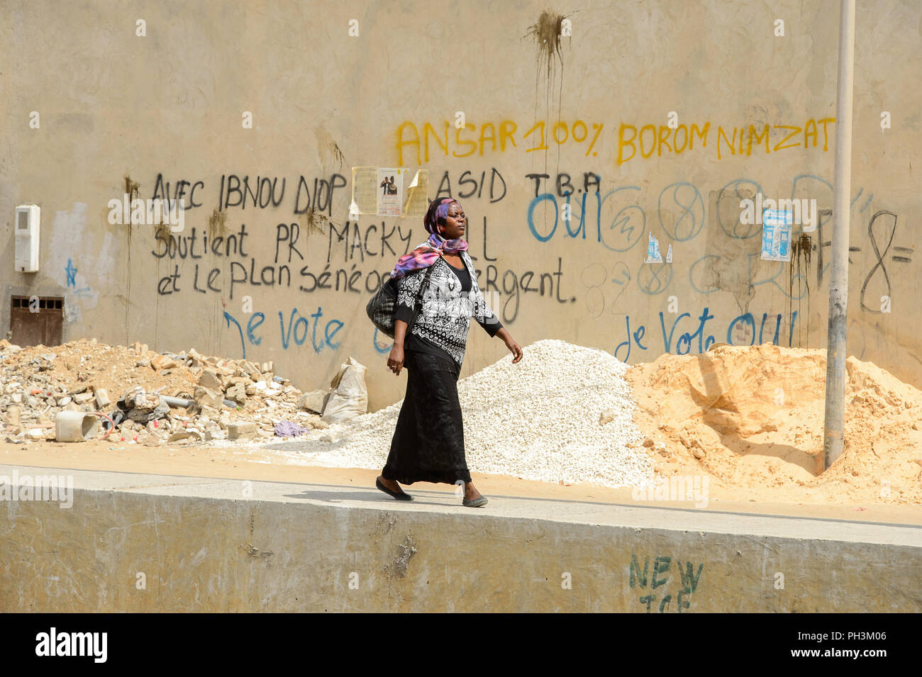 DAKAR, SENEGAL - APR 27, 2017: Unidentified Senegalese woman in black ...