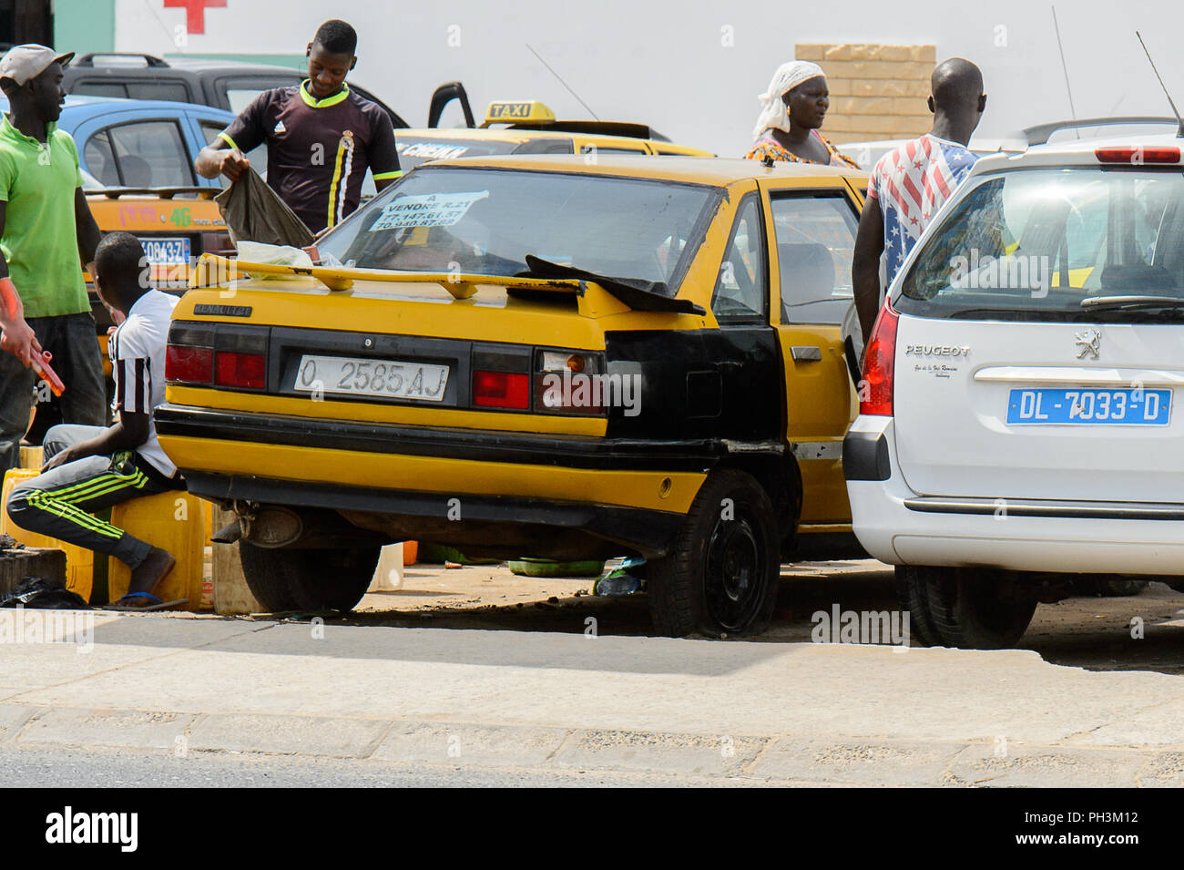 DAKAR, SENEGAL - APR 27, 2017: Unidentified Senegalese people stand ...