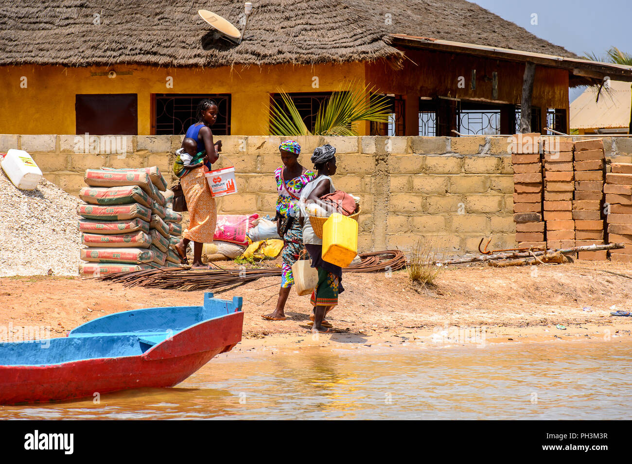 CASAMANCE RIVER, SENEGAL - APR 29: Unidentified Senegalese woman ...