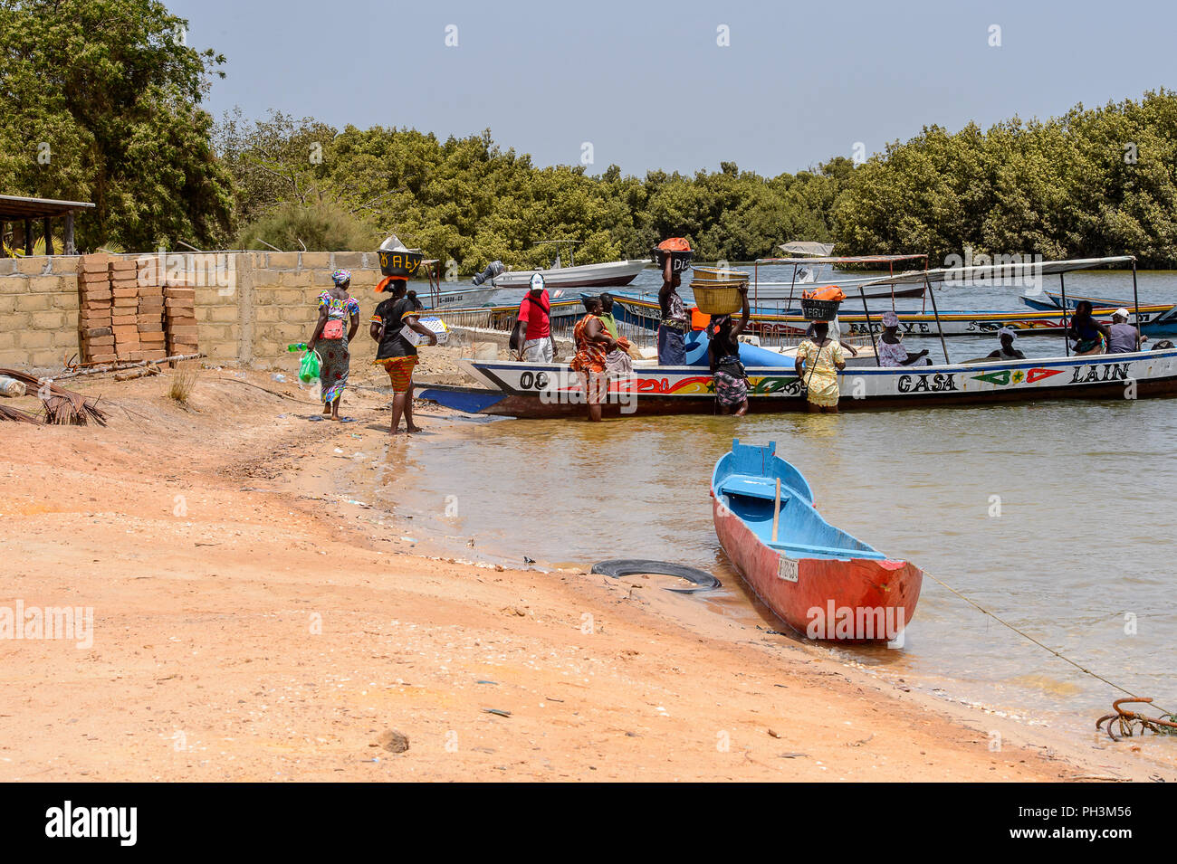 CASAMANCE RIVER, SENEGAL - APR 29: Unidentified Senegalese women in ...