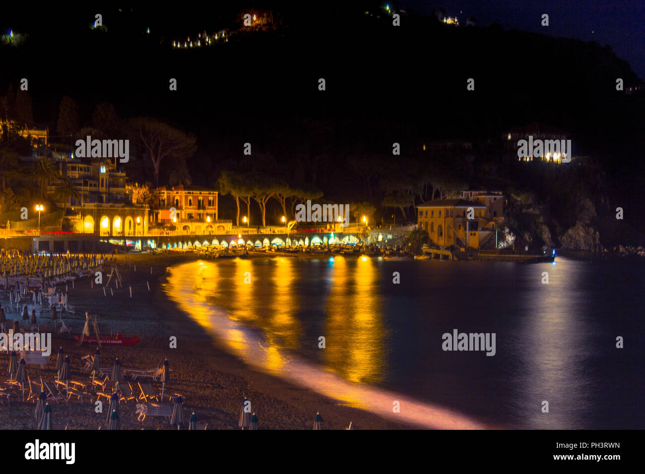 A night view of sea walk "La Pietra" in Levanto, Italy Stock Photo - Alamy