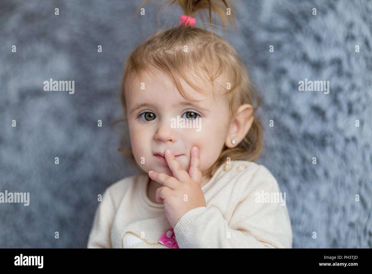 Cute little girl at real home Stock Photo - Alamy