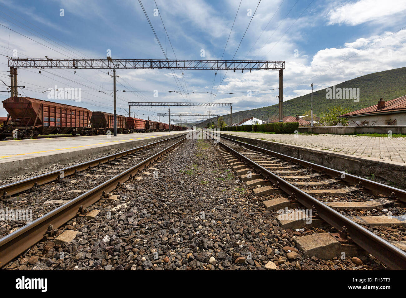Rail road tracks and train cars in Gori, Georgia Stock Photo - Alamy