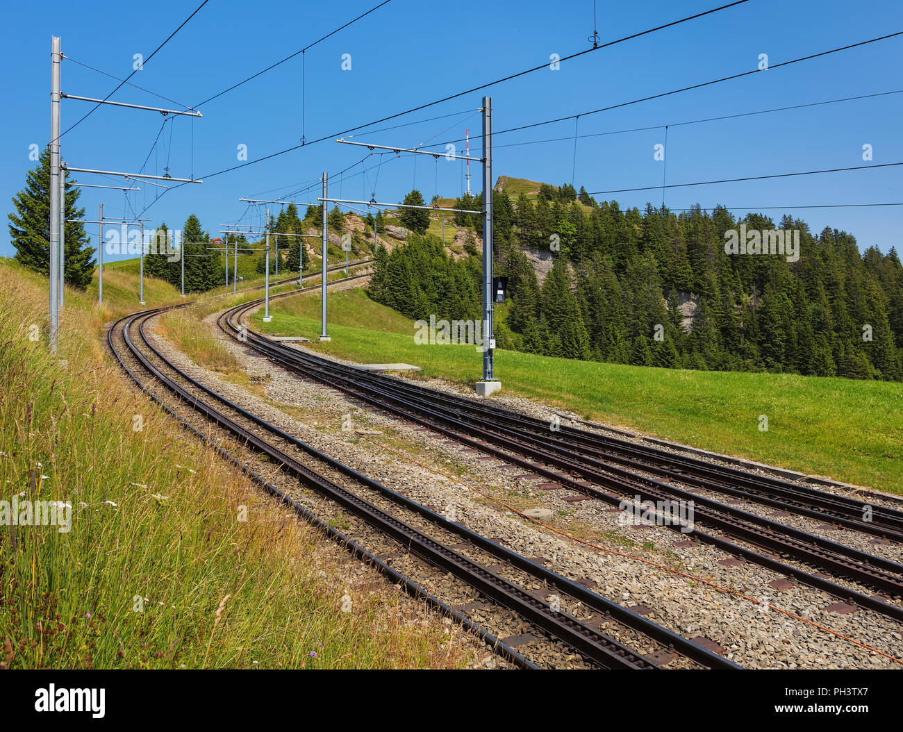 Rack railway on Mt. Rigi in Switzerland in summer. Mt. Rigi is a ...