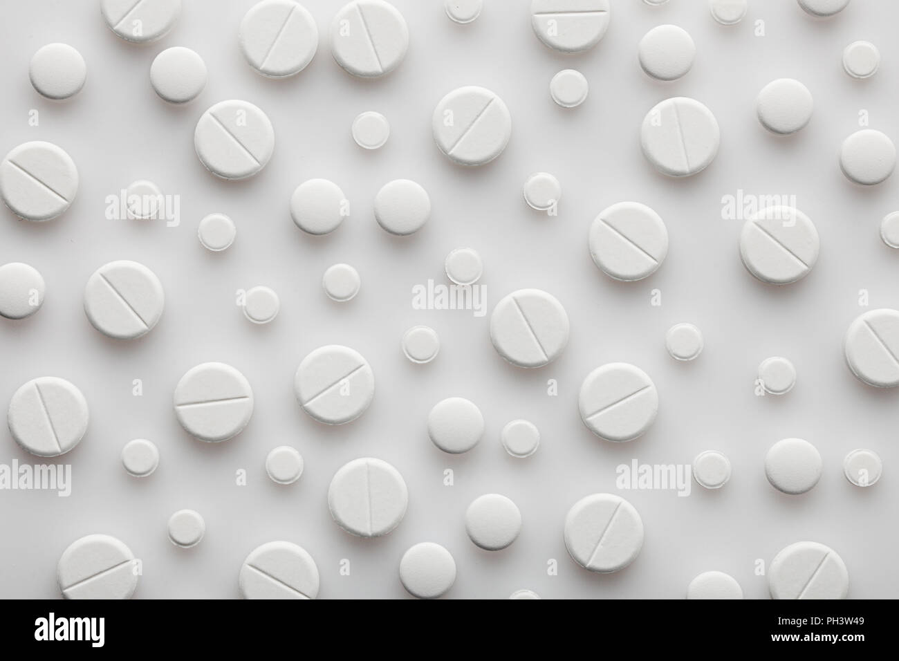 pills background, tablets on a white background Stock Photo - Alamy