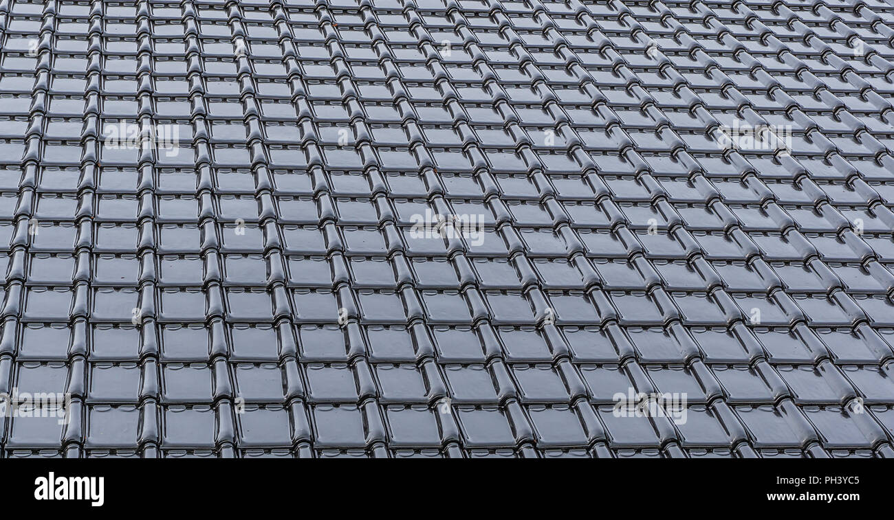 modern black glossy rooftop tiling texture background Stock Photo - Alamy