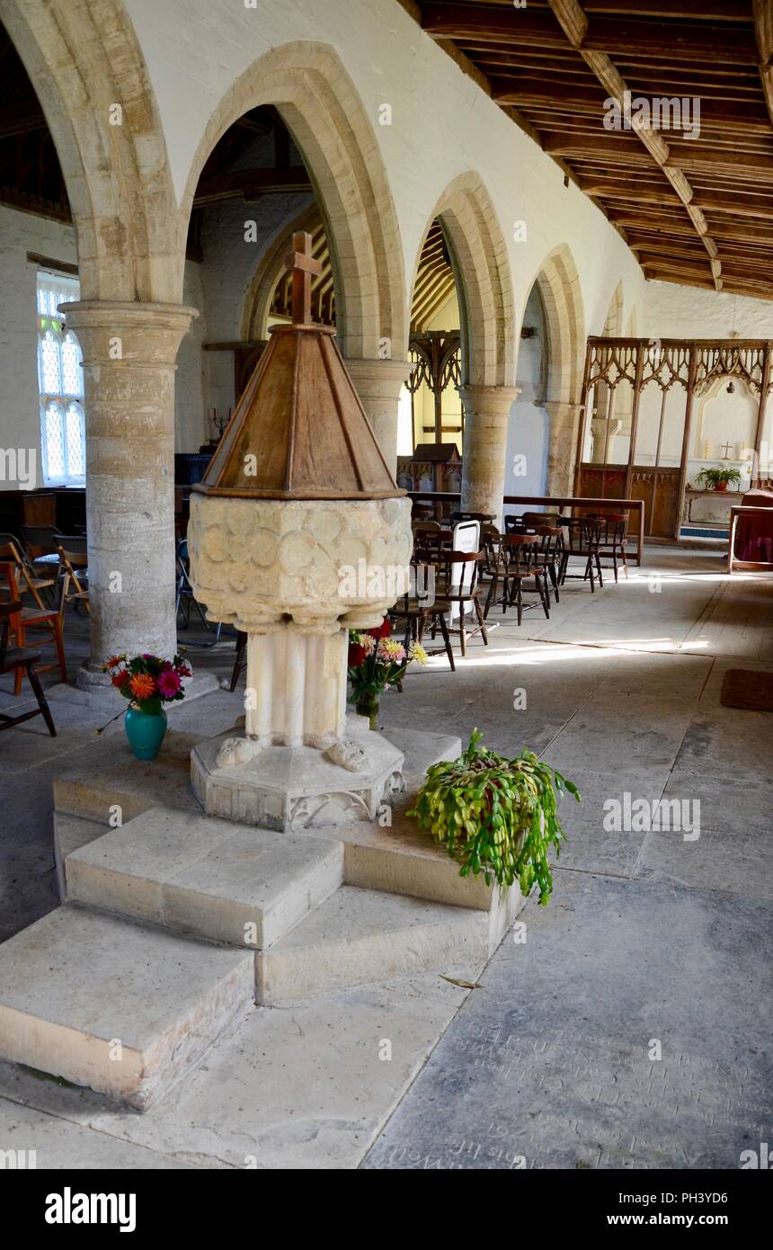 13th or 14th century font in south aisle of All Saints' Church ...