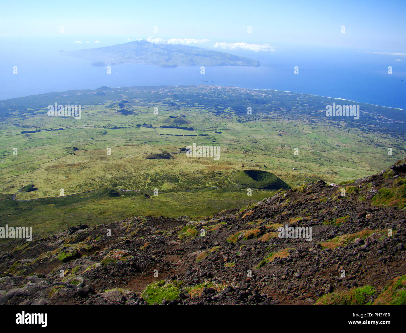 View of Faial island from the summit of Pico volcano (Azores ...