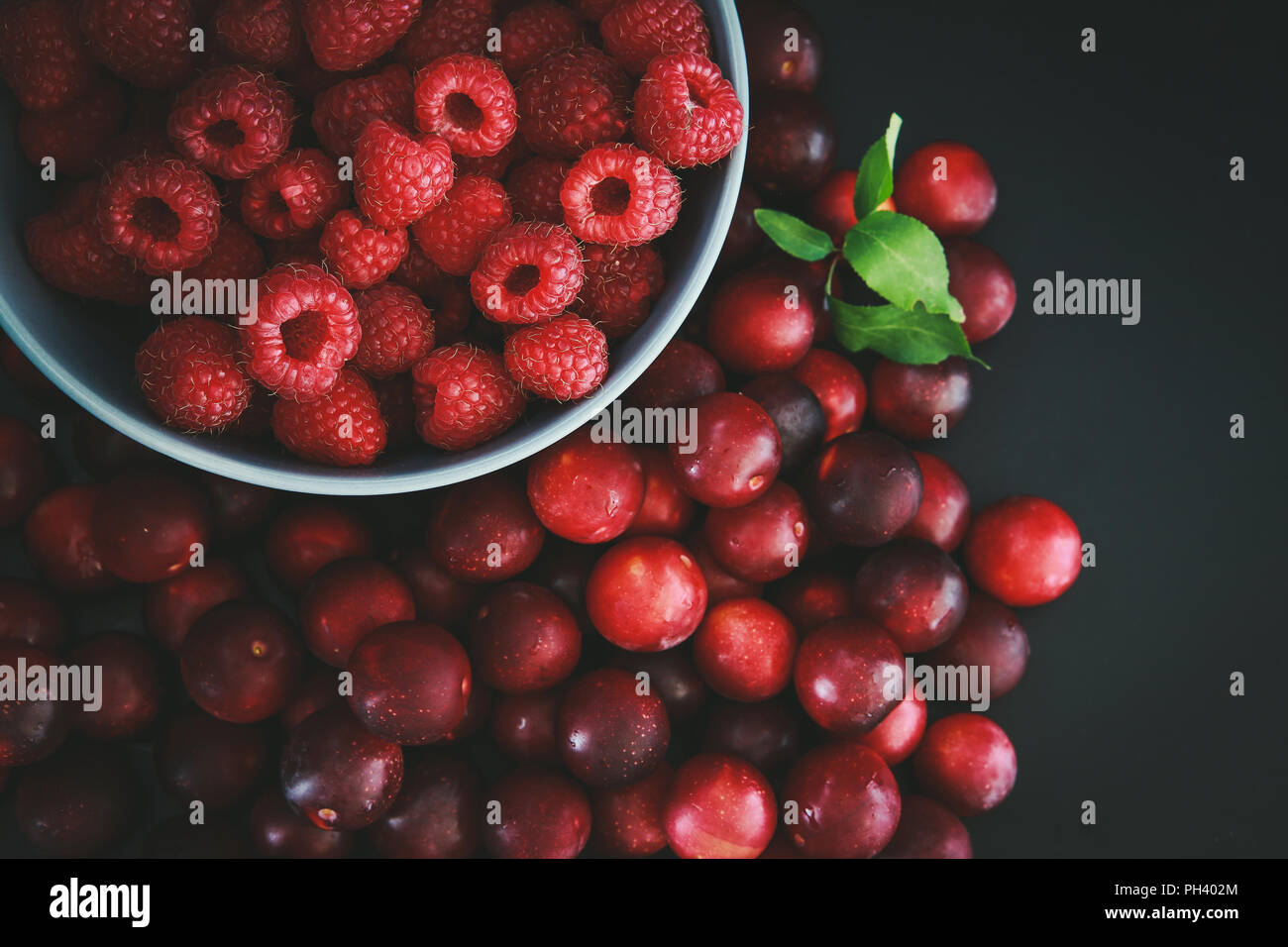 Raspberry and cherry plum Stock Photo - Alamy