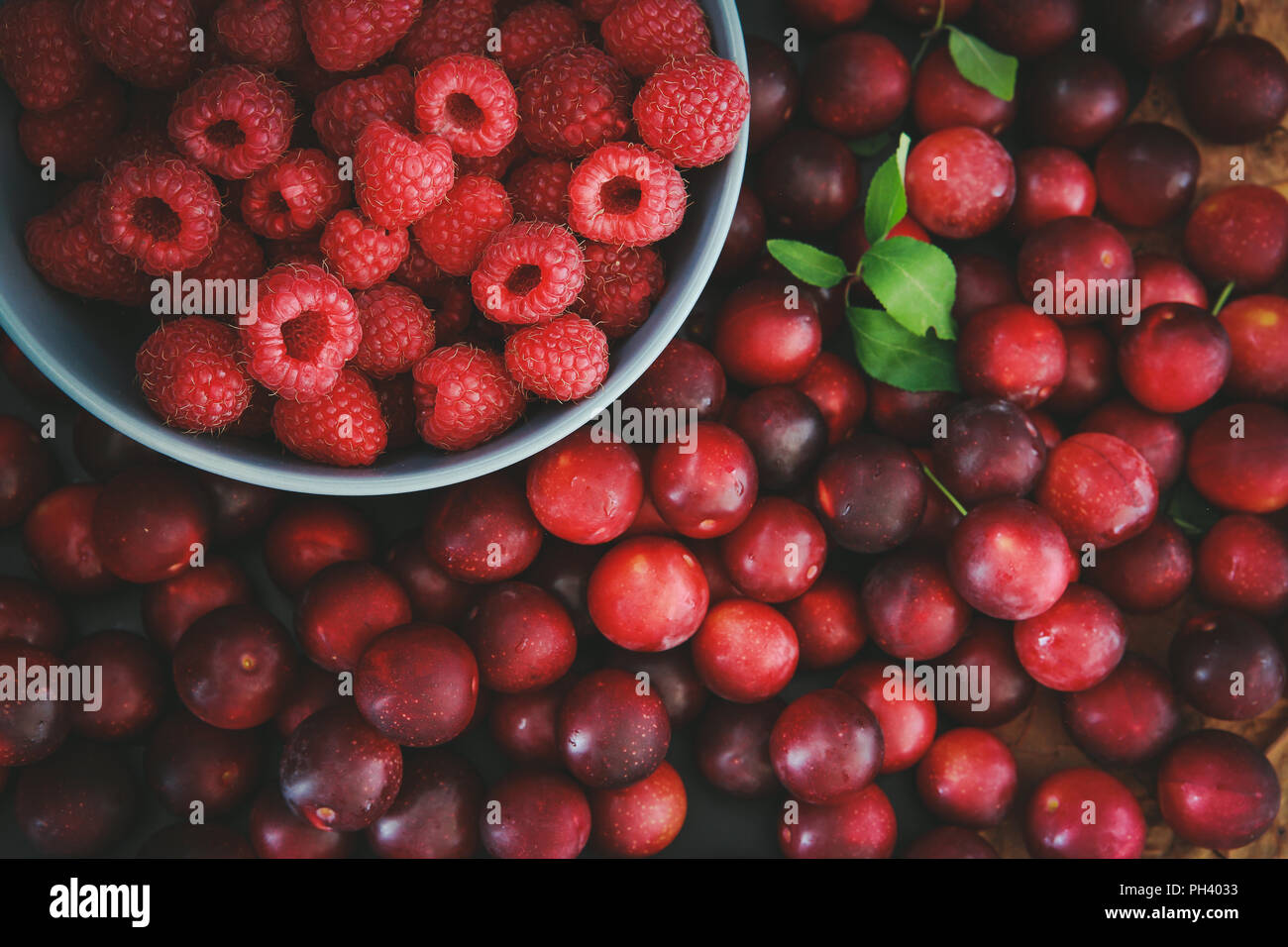 Raspberry and cherry plum Stock Photo - Alamy