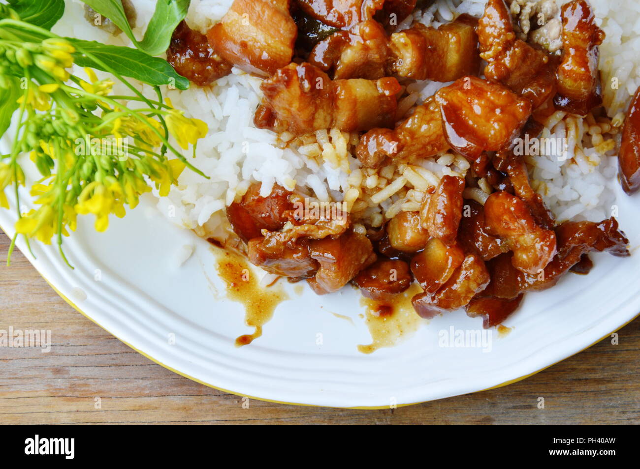 sweet crispy fat pork eat with fresh flower cabbage on rice Stock Photo ...