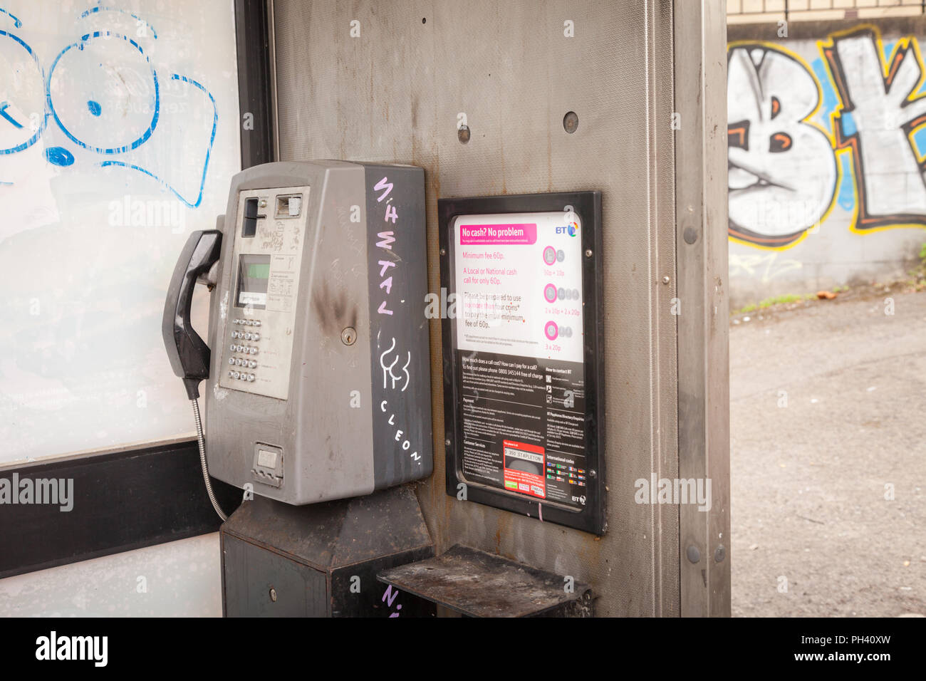 Old BT telecom phone box with graffiti, Bristol UK Stock Photo - Alamy
