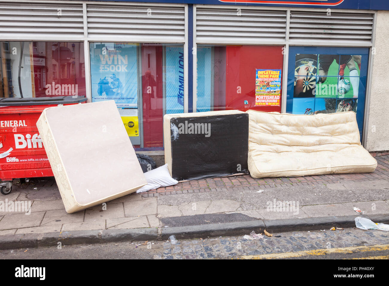 Fly tipping in Bristol city, UK in a street Stock Photo - Alamy