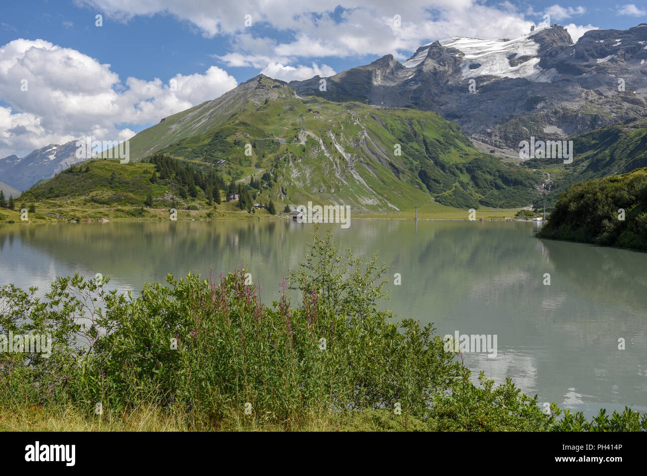 Lake Truebsee and mount Titlis glacier over Engelberg on the Swiss alps ...