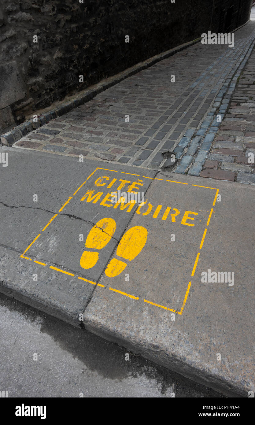 Yellow footprints show the path of Memory City (cité mémoire) in Old ...