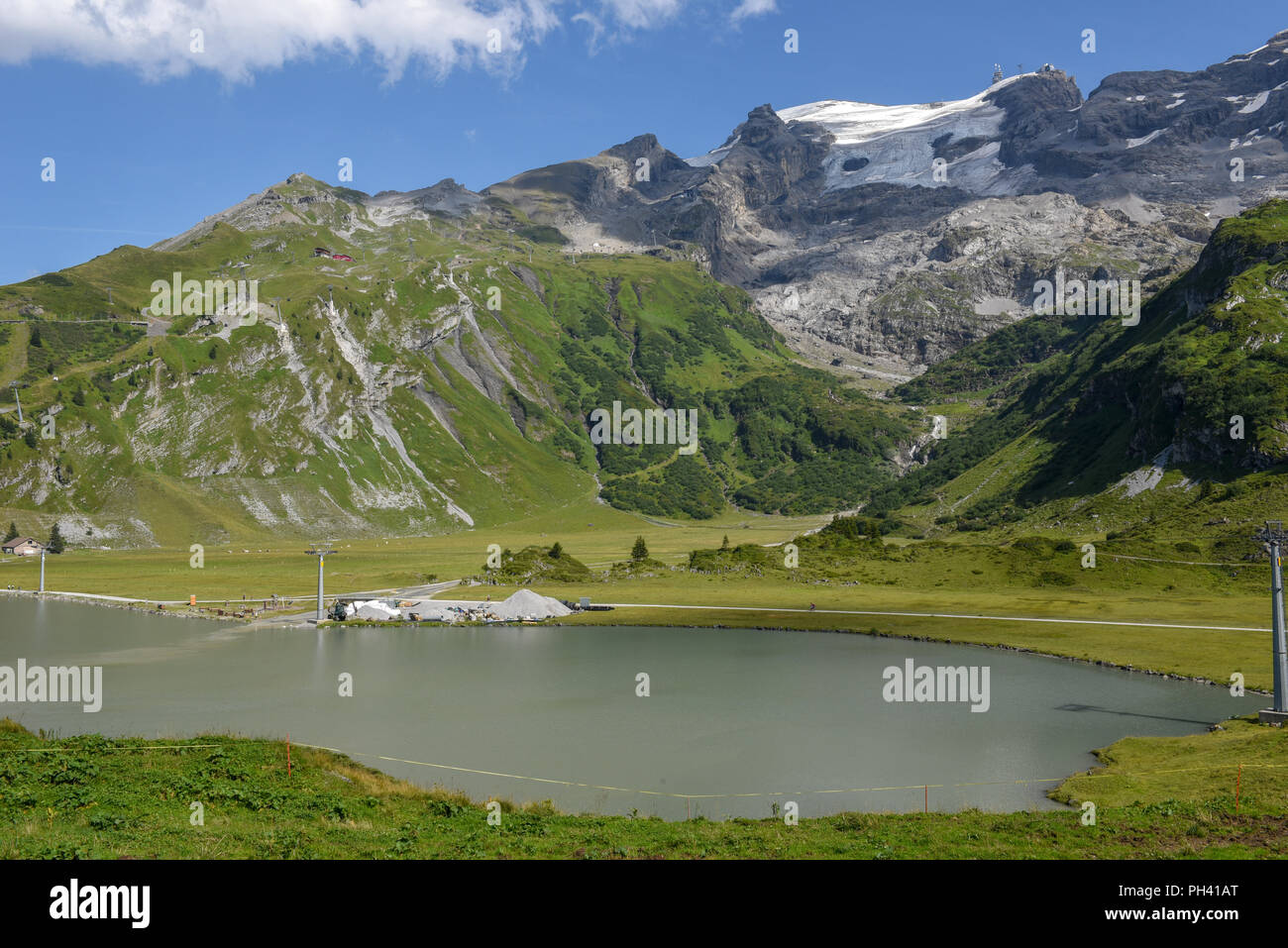 Lake Truebsee and mount Titlis glacier over Engelberg on the Swiss alps ...