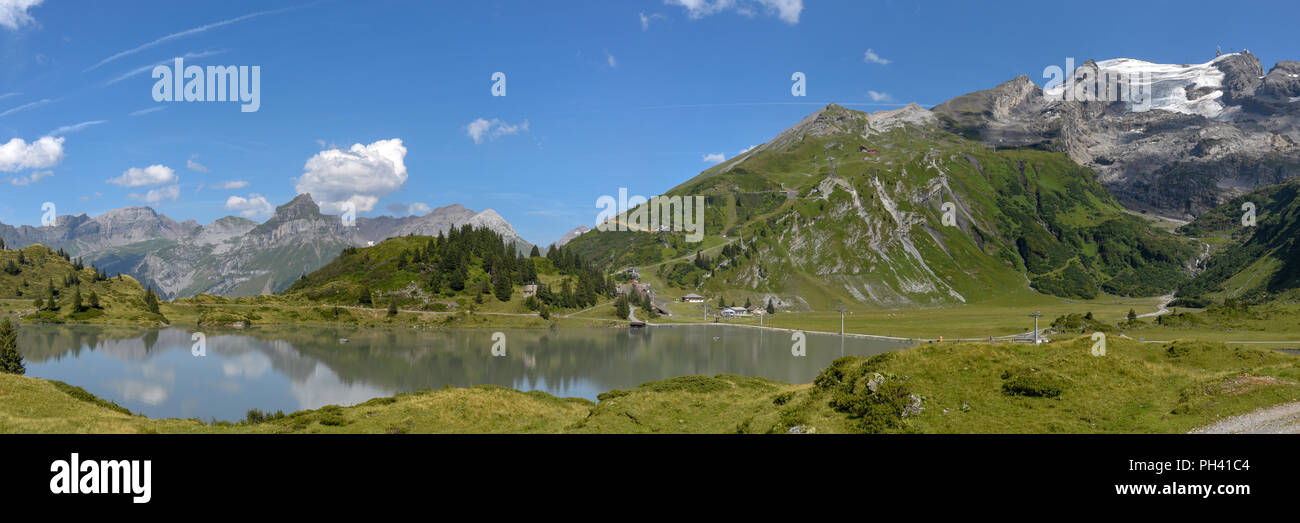 Lake Truebsee and mount Titlis glacier over Engelberg on the Swiss alps ...