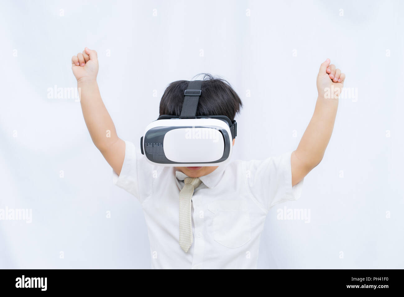 Little boy wear 3D goggles on white background Stock Photo - Alamy